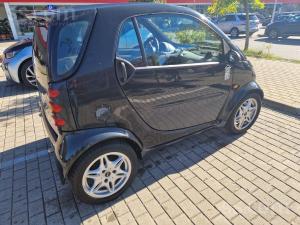Black Smart Fortwo 2004 in Riga, with an engine capacity of 0.70 L and mileage of 124 thousand km for 1200 €, photo 4 on AUTOMOTO.COM.LV