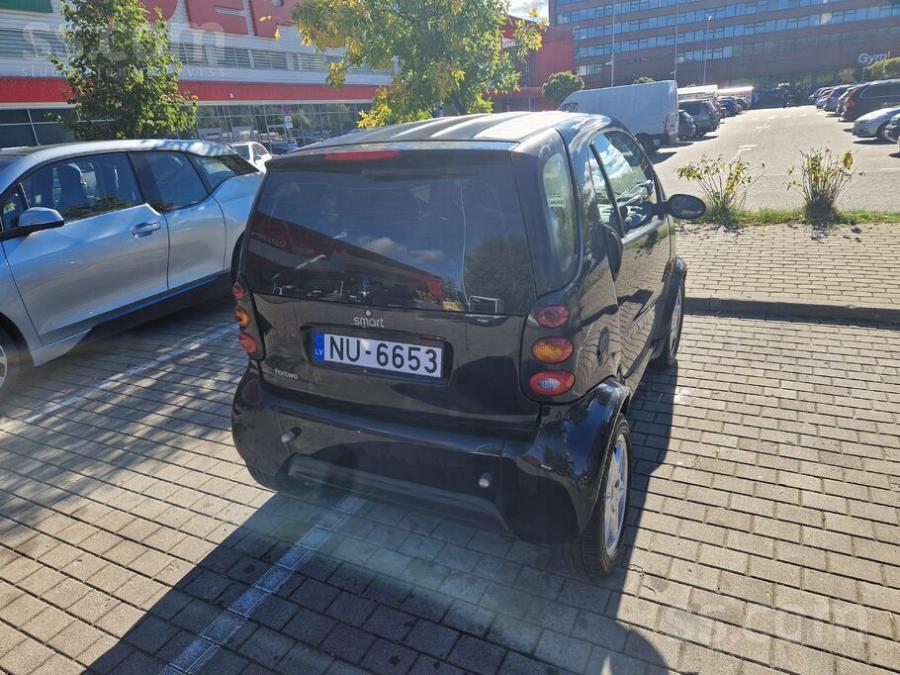 Black Smart Fortwo 2004 in Riga, with an engine capacity of 0.70 L and mileage of 124 thousand km for 1200 €, photo 5 on AUTOMOTO.COM.LV