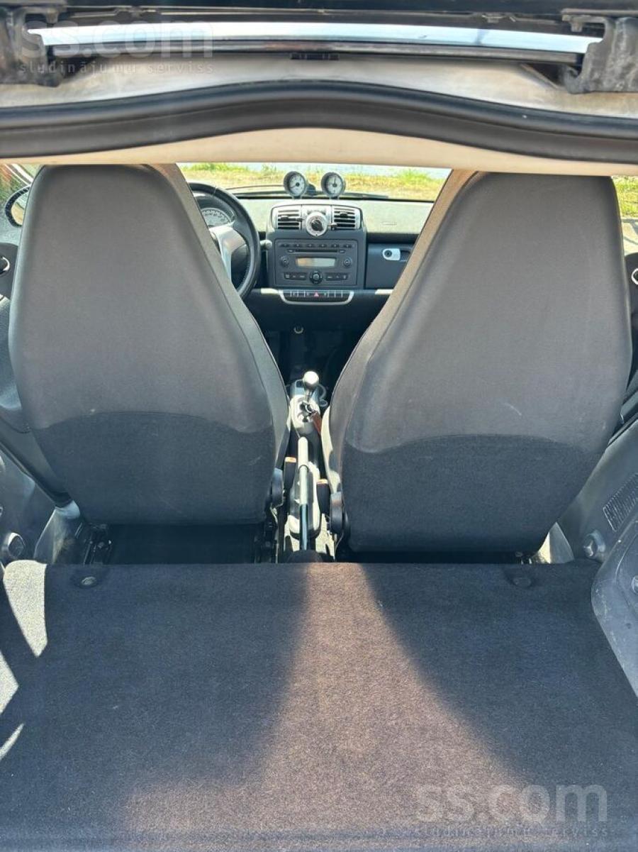 Black Smart Fortwo 2007 in Tukums, with an engine capacity of 0.80 L and mileage of 162 thousand km for 2800 €, photo 15 on AUTOMOTO.COM.LV