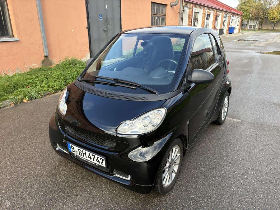 Melns Smart Fortwo 2011 Panevēža, ar dzinēja tilpumu 1.00 L un nobraukumu 215 tūkst. km par 2899 €, foto 1 vietnē AUTOMOTO.COM.LV