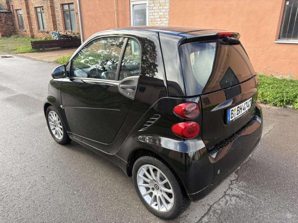 Melns Smart Fortwo 2011 Panevēža, ar dzinēja tilpumu 1.00 L un nobraukumu 215 tūkst. km par 2899 €, foto 4 vietnē AUTOMOTO.COM.LV