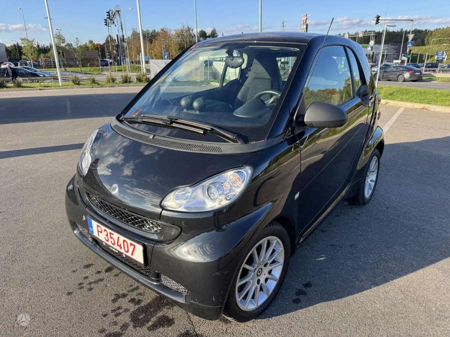 Black Smart Fortwo 2012 in Vilnius, with an engine capacity of 1.00 L and mileage of 90 thousand km for 3850 €, photo 1 on AUTOMOTO.COM.LV