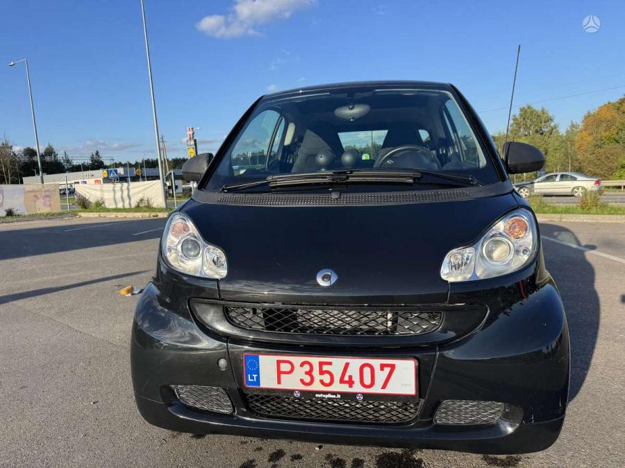 Black Smart Fortwo 2012 in Vilnius, with an engine capacity of 1.00 L and mileage of 90 thousand km for 3850 €, photo 3 on AUTOMOTO.COM.LV