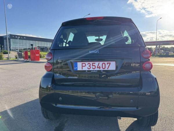 Black Smart Fortwo 2012 in Vilnius, with an engine capacity of 1.00 L and mileage of 90 thousand km for 3850 €, photo 7 on AUTOMOTO.COM.LV