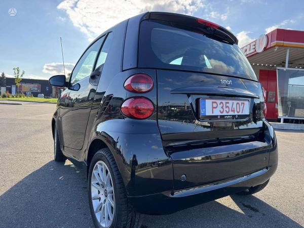 Black Smart Fortwo 2012 in Vilnius, with an engine capacity of 1.00 L and mileage of 90 thousand km for 3850 €, photo 8 on AUTOMOTO.COM.LV