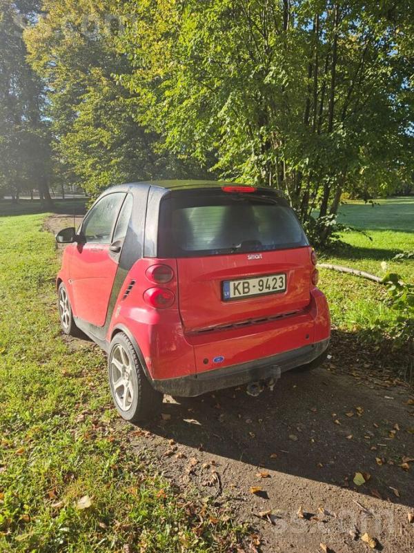Red Smart Fortwo 2009 in Ogre, with an engine capacity of 1.00 L and mileage of 139 thousand km for 2200 €, photo 3 on AUTOMOTO.COM.LV