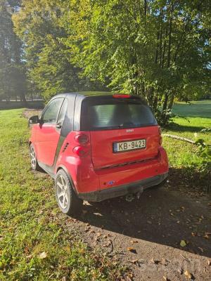 Red Smart Fortwo 2009 in Ogre, with an engine capacity of 1.00 L and mileage of 139 thousand km for 2200 €, photo 3 on AUTOMOTO.COM.LV