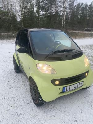 Yellow Smart Fortwo 2001 in Riga, with an engine capacity of 0.60 L and mileage of 132 thousand km for 1500 €, photo 1 on AUTOMOTO.COM.LV