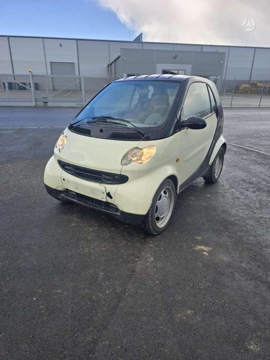 Yellow Smart Fortwo 2007 in Panevezys, with an engine capacity of 0.80 L and mileage of 190 thousand km for 1000 €, photo 4 on AUTOMOTO.COM.LV