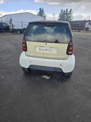 Yellow Smart Fortwo 2007 in Panevezys, with an engine capacity of 0.80 L and mileage of 190 thousand km for 1000 €, photo 5 on AUTOMOTO.COM.LV