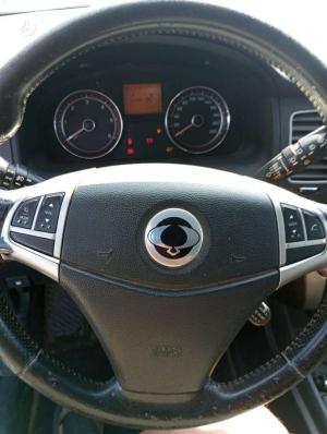 Brown SsangYong Korando 2011 in Kaunas, with an engine capacity of 2.00 L and mileage of 238 thousand km for 1650 €, photo 19 on AUTOMOTO.COM.LV