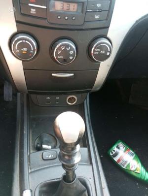Brown SsangYong Korando 2011 in Kaunas, with an engine capacity of 2.00 L and mileage of 238 thousand km for 1650 €, photo 17 on AUTOMOTO.COM.LV