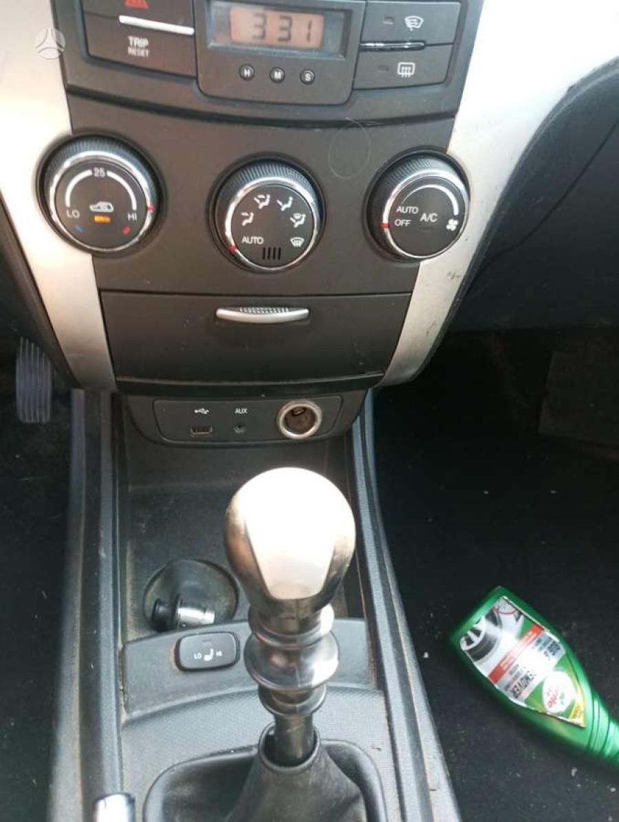 Brown SsangYong Korando 2011 in Kaunas, with an engine capacity of 2.00 L and mileage of 238 thousand km for 1650 €, photo 17 on AUTOMOTO.COM.LV