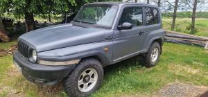 Grey SsangYong Korando 2001 in Salcininkai, with an engine capacity of 2.00 L and mileage of 274 thousand km for 1700 €, photo 4 on AUTOMOTO.COM.LV