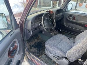 Sarkans SsangYong Korando 1998 Ignalina, ar dzinēja tilpumu 2.30 L un nobraukumu 300 tūkst. km par 1200 €, foto 10 vietnē AUTOMOTO.COM.LV