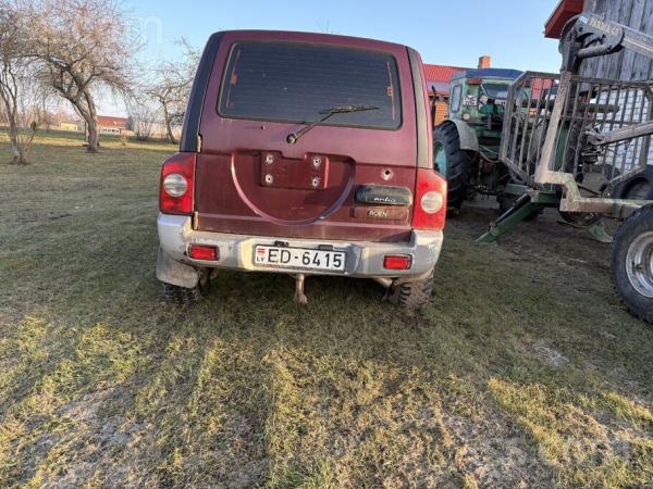 Sarkans SsangYong Korando 2001 Gulbene, ar dzinēja tilpumu 2.00 L un nobraukumu 291 tūkst. km par 1900 €, foto 3 vietnē AUTOMOTO.COM.LV