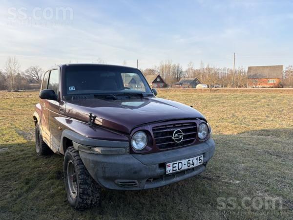 Sarkans SsangYong Korando 2001 Gulbene, ar dzinēja tilpumu 2.00 L un nobraukumu 291 tūkst. km par 1900 €, foto 4 vietnē AUTOMOTO.COM.LV