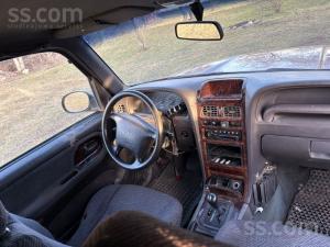 Sarkans SsangYong Korando 2001 Gulbene, ar dzinēja tilpumu 2.00 L un nobraukumu 291 tūkst. km par 1900 €, foto 6 vietnē AUTOMOTO.COM.LV
