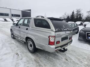 Grey SsangYong Musso 2005 in Ukmerge, with an engine capacity of 2.90 L and mileage of 248 thousand km for 2450 €, photo  on AUTOMOTO.COM.LV