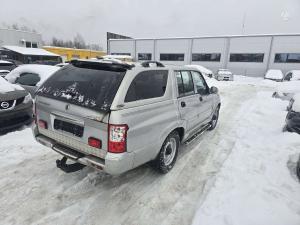 Grey SsangYong Musso 2005 in Ukmerge, with an engine capacity of 2.90 L and mileage of 248 thousand km for 2450 €, photo 2 on AUTOMOTO.COM.LV