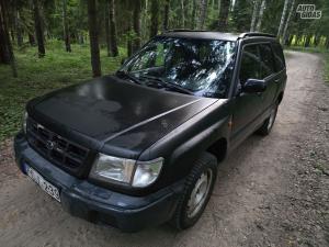 Черный Субару Форестер 1998 в Радвилишкис, объемом двигателя 2.00 л и пробегом 39 тыс. км за 1600 €, фото 4 на AUTOMOTO.COM.LV