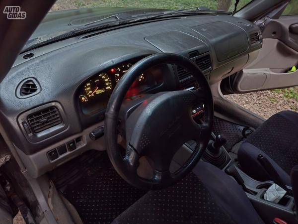 Melns Subaru Forester 1998 Radviliškis, ar dzinēja tilpumu 2.00 L un nobraukumu 39 tūkst. km par 1600 €, foto 10 vietnē AUTOMOTO.COM.LV