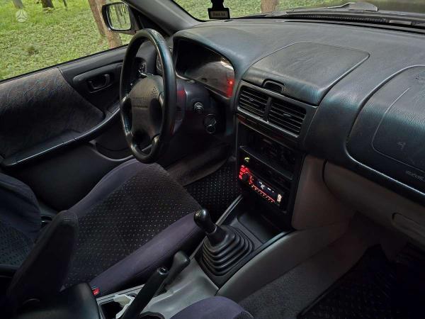 Black Subaru Forester 1998 in Radviliskis, with an engine capacity of 2.00 L and mileage of 287 thousand km for 1450 €, photo 7 on AUTOMOTO.COM.LV