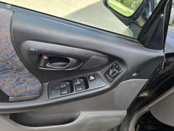 Melns Subaru Forester 1998 Radviliškis, ar dzinēja tilpumu 2.00 L un nobraukumu 322 tūkst. km par 1250 €, foto 7 vietnē AUTOMOTO.COM.LV