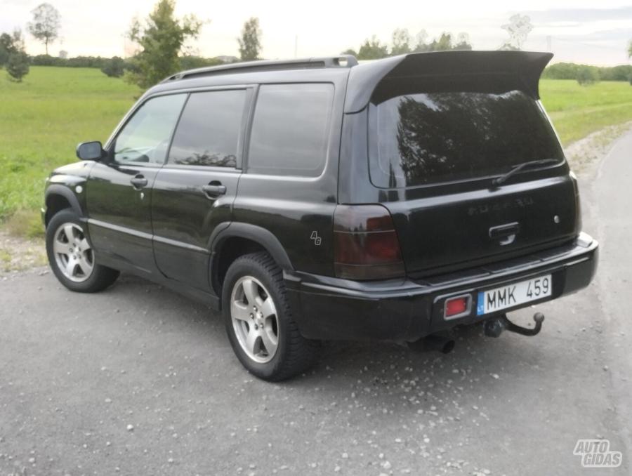 Black Subaru Forester 1998 in Silute, with an engine capacity of 2.00 L and mileage of 264 thousand km for 3650 €, photo 5 on AUTOMOTO.COM.LV