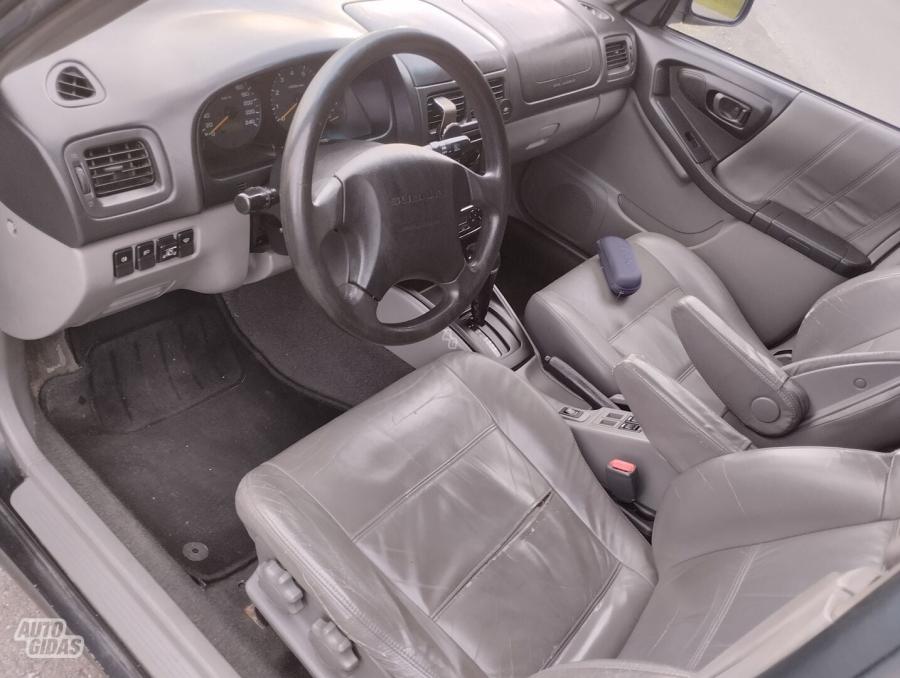 Black Subaru Forester 1998 in Silute, with an engine capacity of 2.00 L and mileage of 264 thousand km for 3650 €, photo 6 on AUTOMOTO.COM.LV