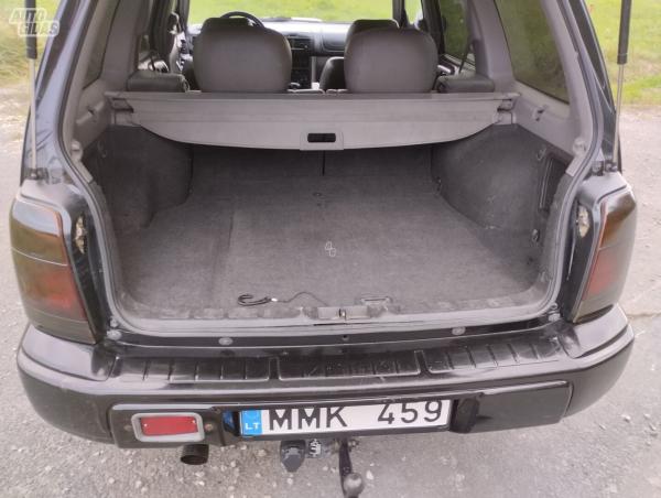 Black Subaru Forester 1998 in Silute, with an engine capacity of 2.00 L and mileage of 264 thousand km for 3650 €, photo 11 on AUTOMOTO.COM.LV