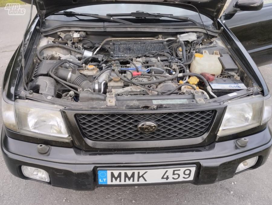 Black Subaru Forester 1998 in Silute, with an engine capacity of 2.00 L and mileage of 264 thousand km for 3650 €, photo 12 on AUTOMOTO.COM.LV