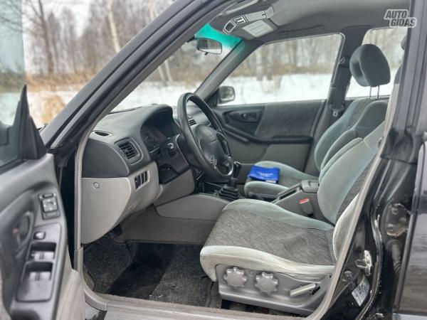 Black Subaru Forester 2000 in Vilnius, with an engine capacity of 2.00 L and mileage of 340 thousand km for 1950 €, photo 8 on AUTOMOTO.COM.LV