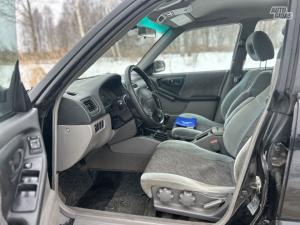 Black Subaru Forester 2000 in Vilnius, with an engine capacity of 2.00 L and mileage of 340 thousand km for 1950 €, photo 8 on AUTOMOTO.COM.LV