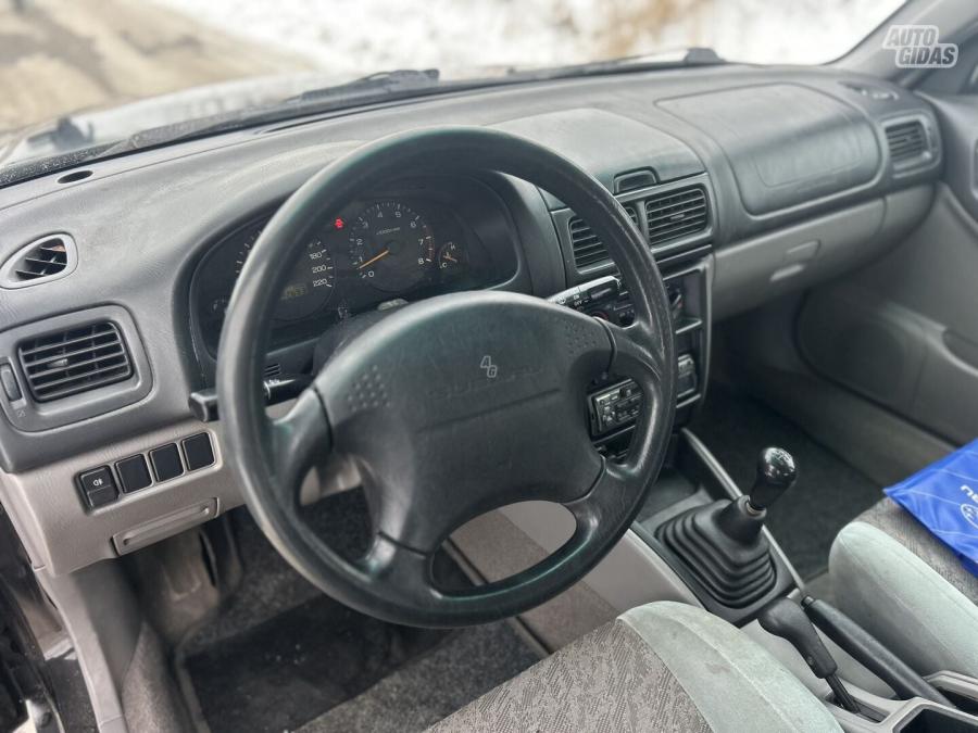 Black Subaru Forester 2000 in Vilnius, with an engine capacity of 2.00 L and mileage of 340 thousand km for 1950 €, photo 10 on AUTOMOTO.COM.LV