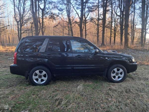 Melns Subaru Forester 2003 Kazlų Rūda, ar dzinēja tilpumu 2.00 L un nobraukumu 299 tūkst. km par 3200 €, foto 1 vietnē AUTOMOTO.COM.LV