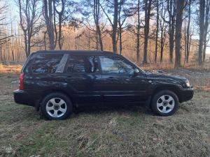 Black Subaru Forester 2003 in Kazlu Ruda, with an engine capacity of 2.00 L and mileage of 299 thousand km for 3200 €, photo  on AUTOMOTO.COM.LV