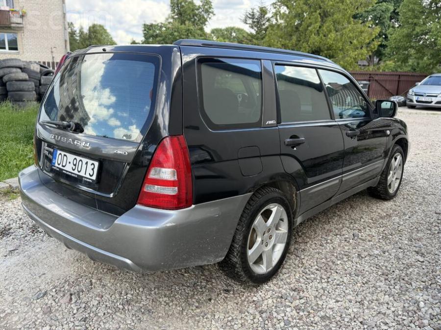 Black Subaru Forester 2003 in Kuldiga, with an engine capacity of 2.00 L and mileage of 330 thousand km for 1750 €, photo 4 on AUTOMOTO.COM.LV