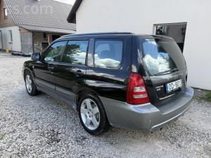Black Subaru Forester 2003 in Kuldiga, with an engine capacity of 2.00 L and mileage of 330 thousand km for 1750 €, photo 5 on AUTOMOTO.COM.LV