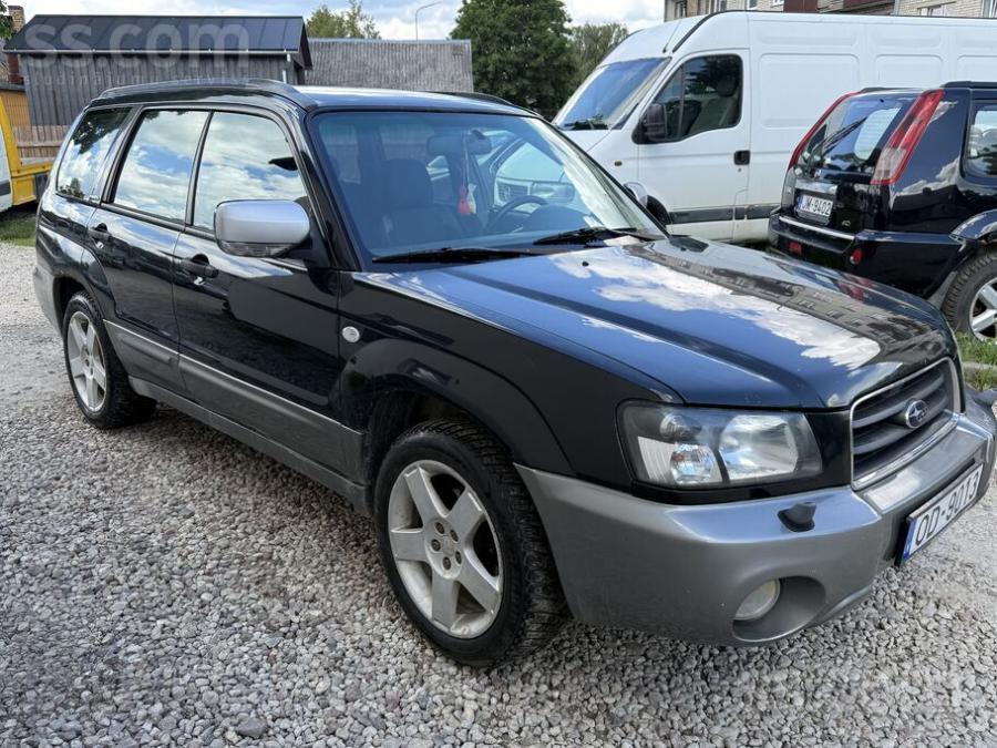 Black Subaru Forester 2003 in Kuldiga, with an engine capacity of 2.00 L and mileage of 330 thousand km for 1750 €, photo 6 on AUTOMOTO.COM.LV