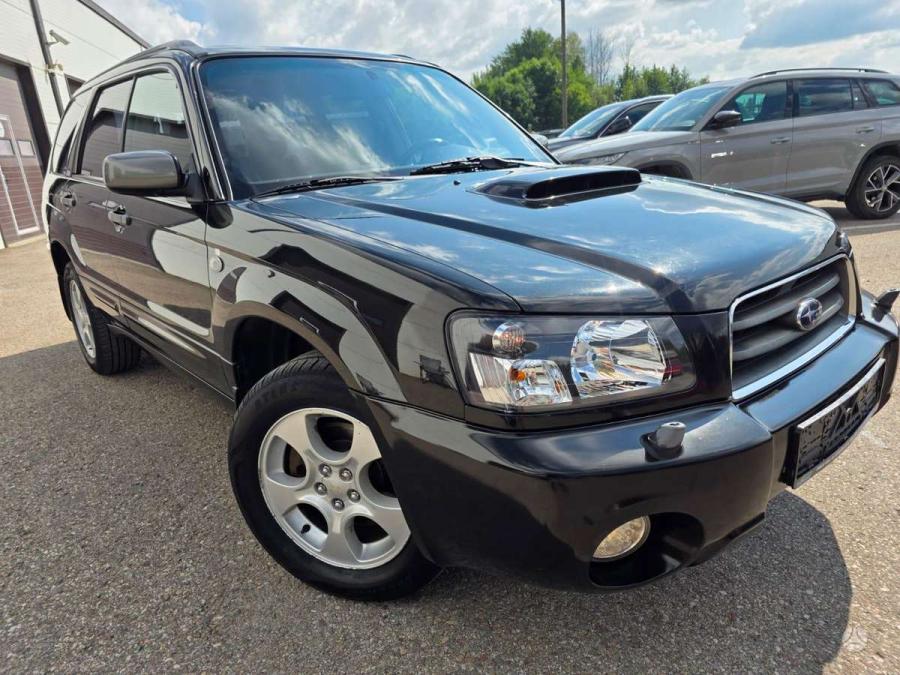 Black Subaru Forester 2004 in Utena, with an engine capacity of 1.99 L and mileage of 270 thousand km for 4850 €, photo 1 on AUTOMOTO.COM.LV