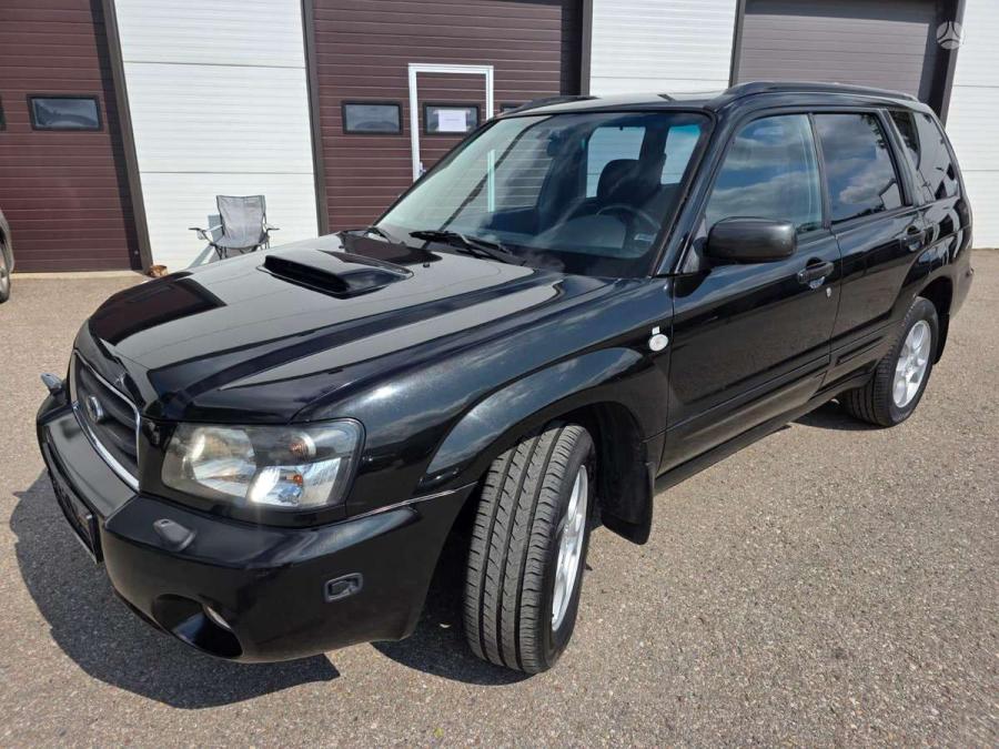 Black Subaru Forester 2004 in Utena, with an engine capacity of 1.99 L and mileage of 270 thousand km for 4850 €, photo 8 on AUTOMOTO.COM.LV