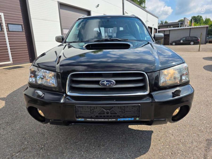Black Subaru Forester 2004 in Utena, with an engine capacity of 1.99 L and mileage of 270 thousand km for 4850 €, photo 9 on AUTOMOTO.COM.LV