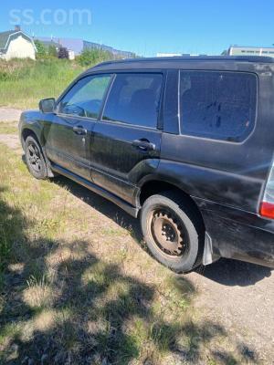 Melns Subaru Forester 2006 Rīga, ar dzinēja tilpumu 2.00 L un nobraukumu 327 tūkst. km par 1300 €, foto 5 vietnē AUTOMOTO.COM.LV