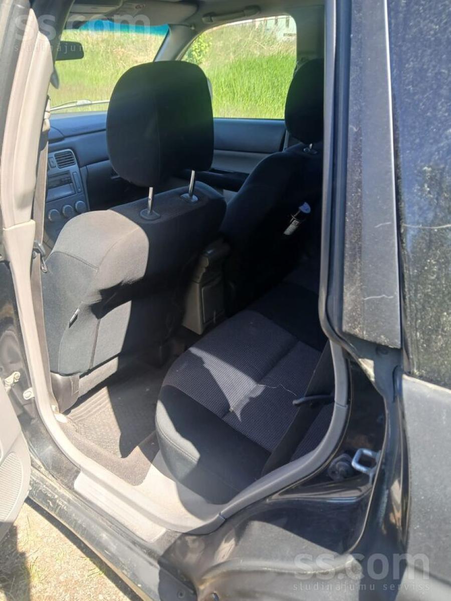 Melns Subaru Forester 2006 Rīga, ar dzinēja tilpumu 2.00 L un nobraukumu 327 tūkst. km par 1300 €, foto 8 vietnē AUTOMOTO.COM.LV