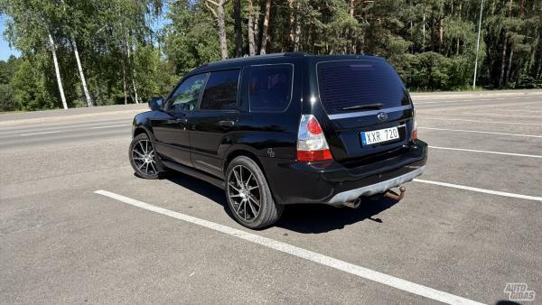 Black Subaru Forester 2006 in Elektrenai, with an engine capacity of 2.50 L and mileage of 230 thousand km for 5500 €, photo 5 on AUTOMOTO.COM.LV