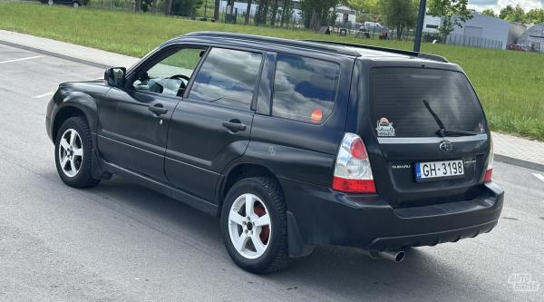 Black Subaru Forester 2007 in Siauliai, with an engine capacity of 2.00 L and mileage of 219 thousand km for 2250 €, photo 8 on AUTOMOTO.COM.LV