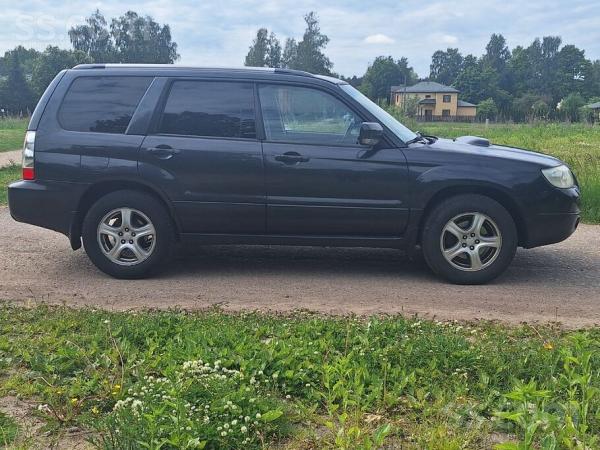 Black Subaru Forester 2007 in Riga, with an engine capacity of 2.50 L and mileage of 247 thousand km for 3650 €, photo 4 on AUTOMOTO.COM.LV