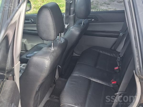 Black Subaru Forester 2007 in Riga, with an engine capacity of 2.50 L and mileage of 247 thousand km for 3650 €, photo 9 on AUTOMOTO.COM.LV