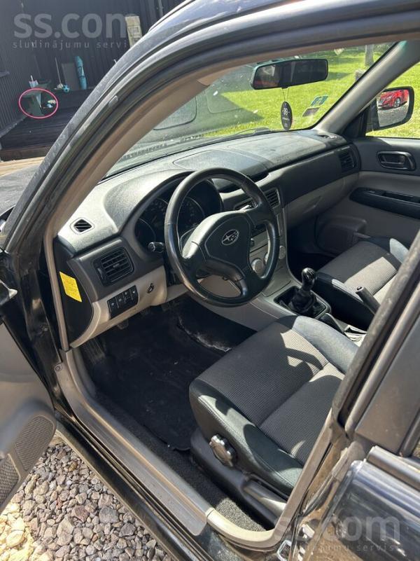 Black Subaru Forester 2007 in Riga, with an engine capacity of 2.00 L and mileage of 301 thousand km for 1900 €, photo 8 on AUTOMOTO.COM.LV